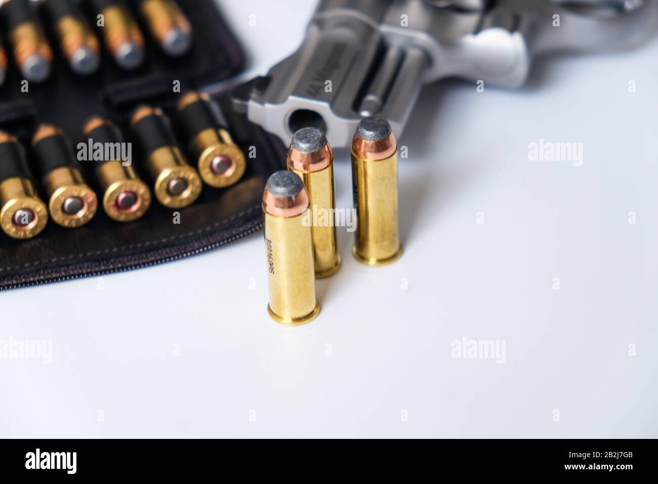.44 magnum revolver gun with bullet on white background, Crime concept ...