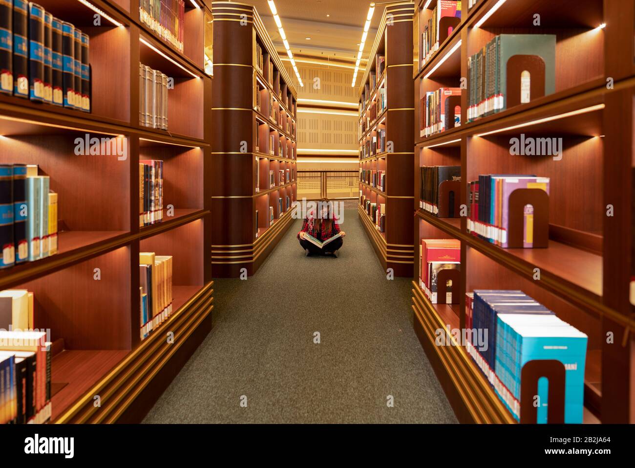 Ankara/Turkey - February 29 2020: Student girl sitting on the floor ...