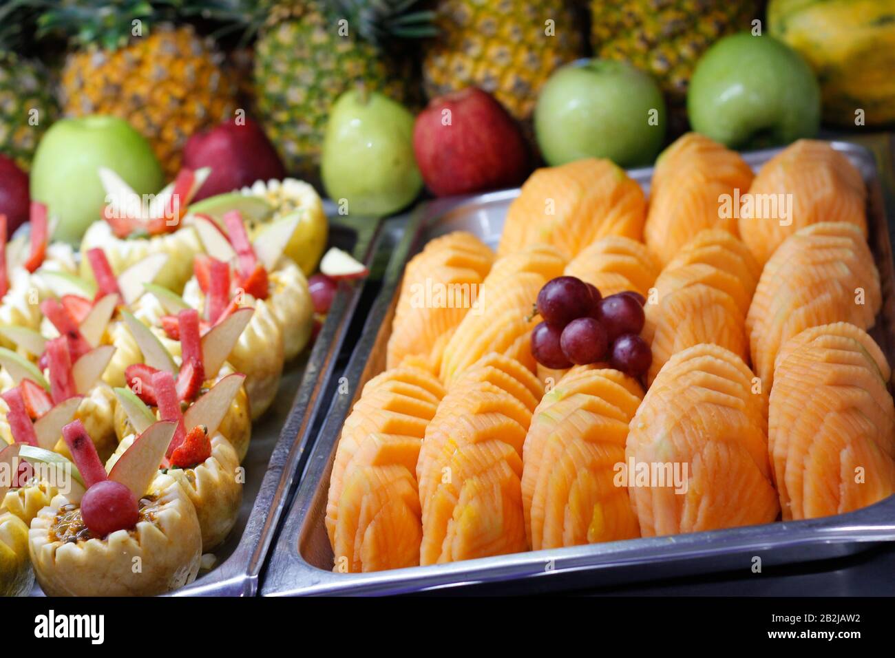 Trays full of fruit slices Stock Photo - Alamy