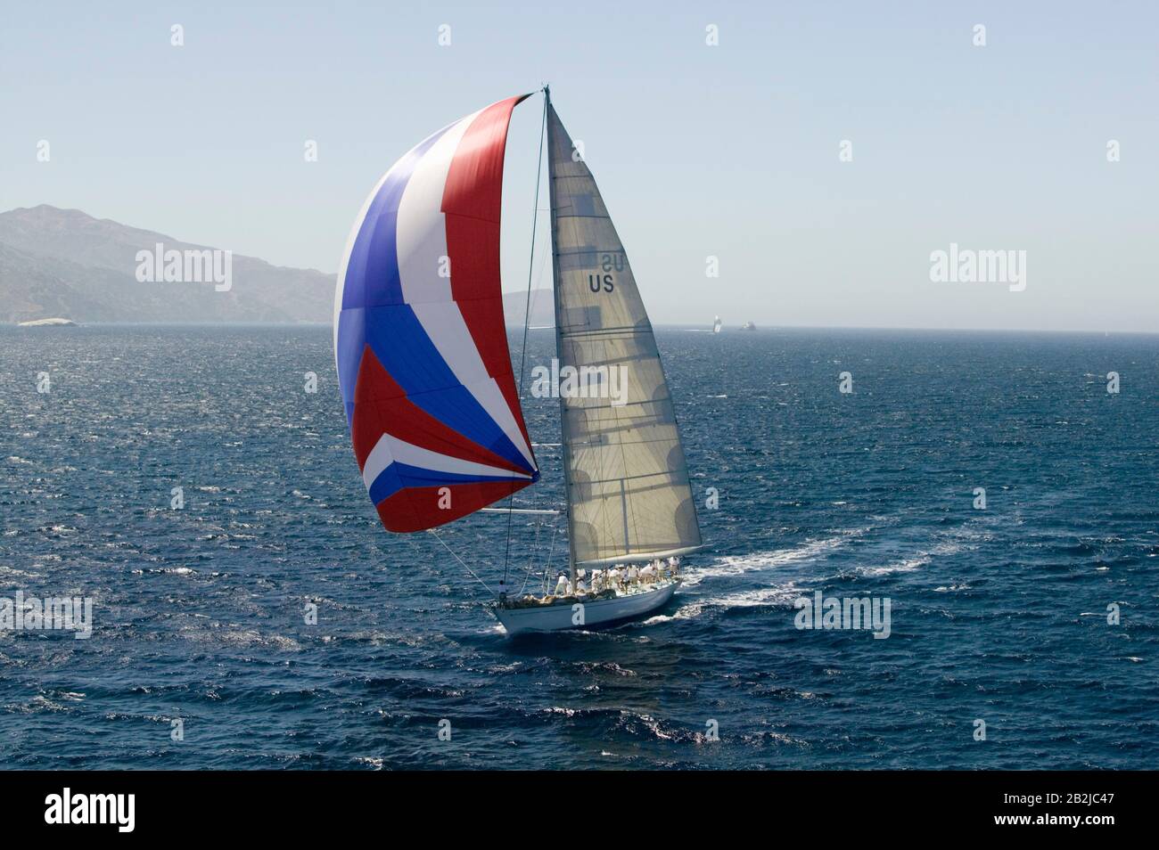 Sailboat on ocean Stock Photo - Alamy