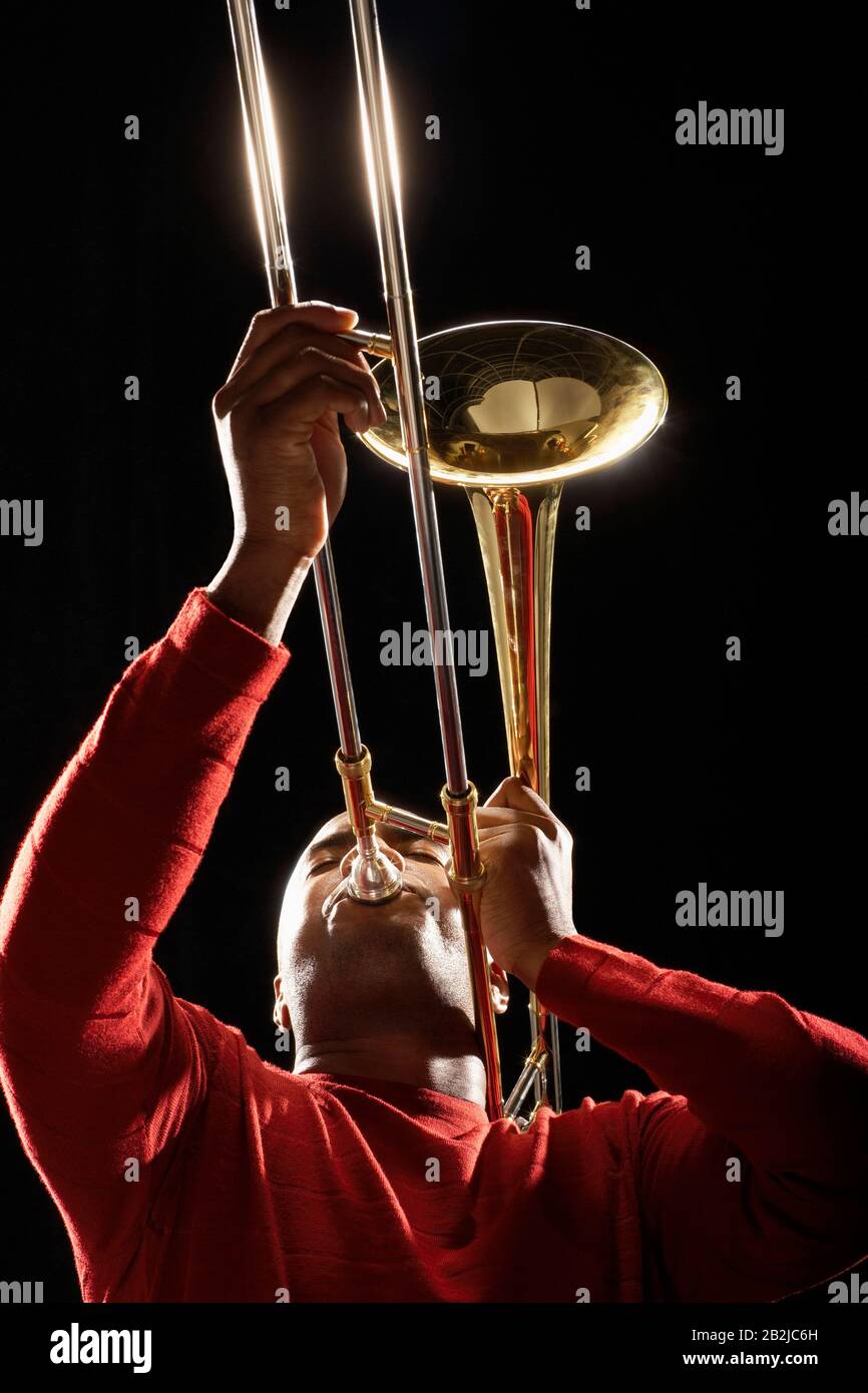 Man playing trombone hi-res stock photography and images - Alamy