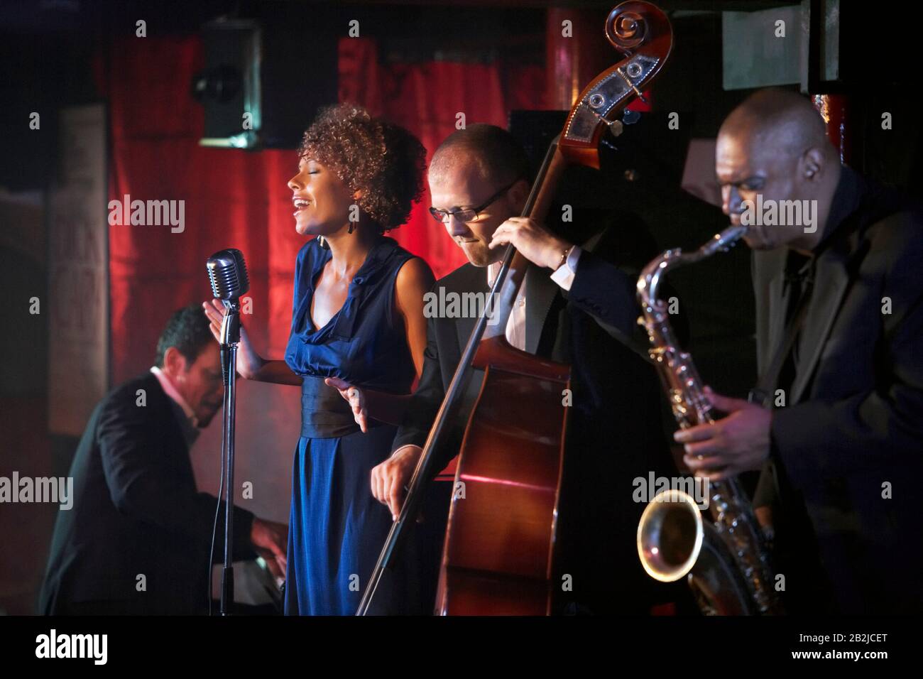 Jazz band performing in nightclub Stock Photo - Alamy
