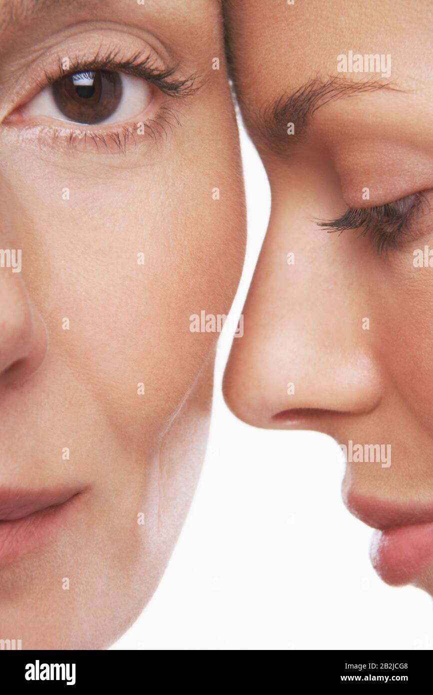 Two beautiful women face to face Stock Photo - Alamy