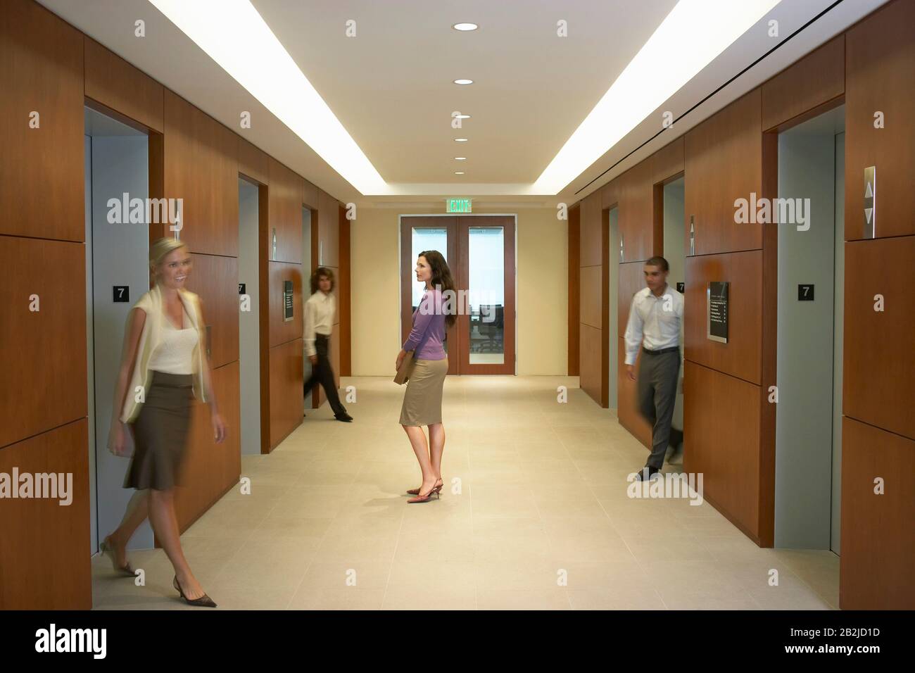 People in elevator lobby Stock Photo - Alamy
