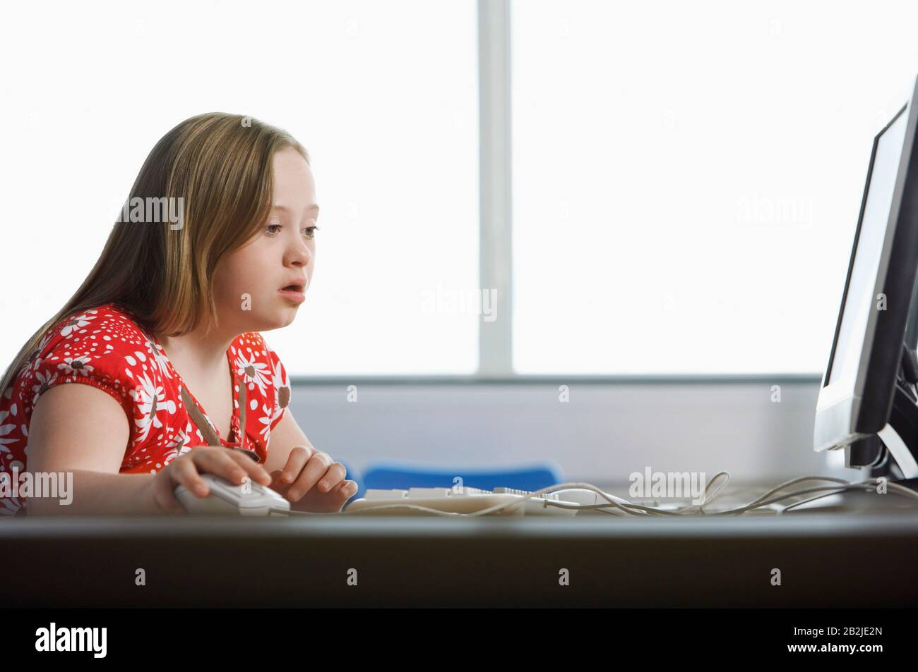 Down syndrome girl computer hi-res stock photography and images - Alamy