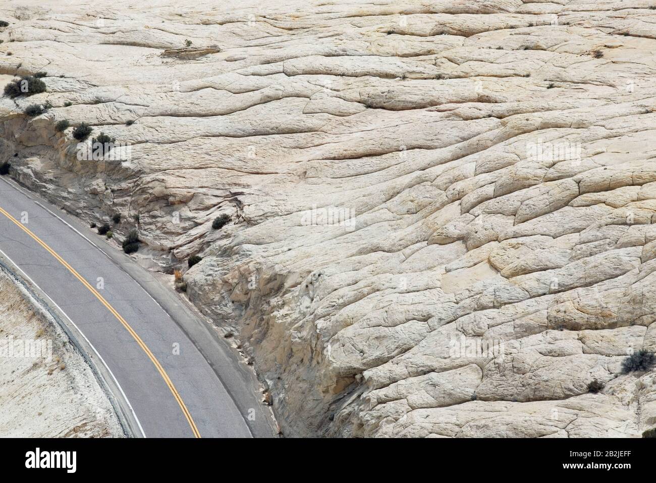Road through rock formation in desert elevated view Stock Photo - Alamy