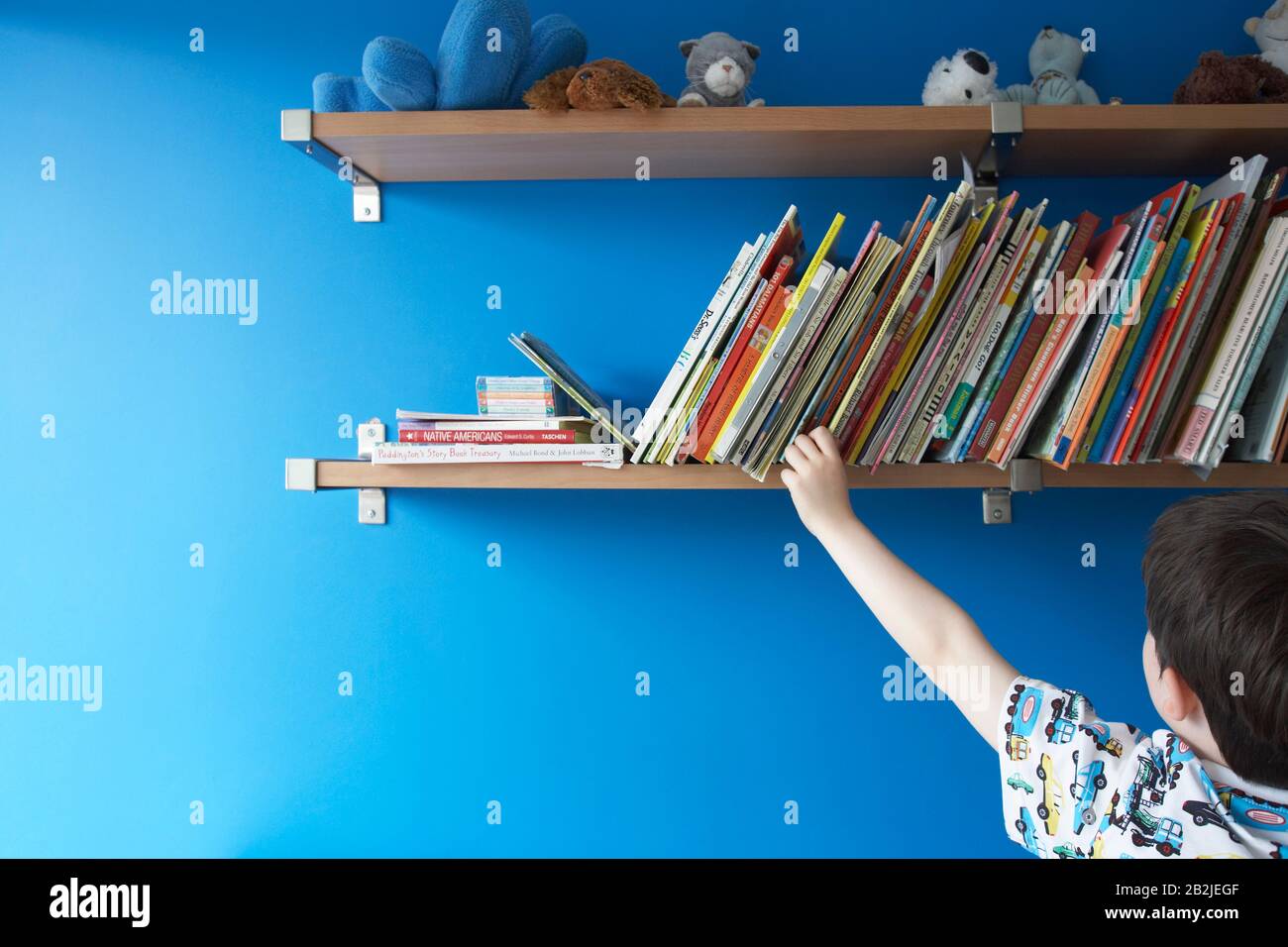 Boy choosing toy hi-res stock photography and images - Alamy