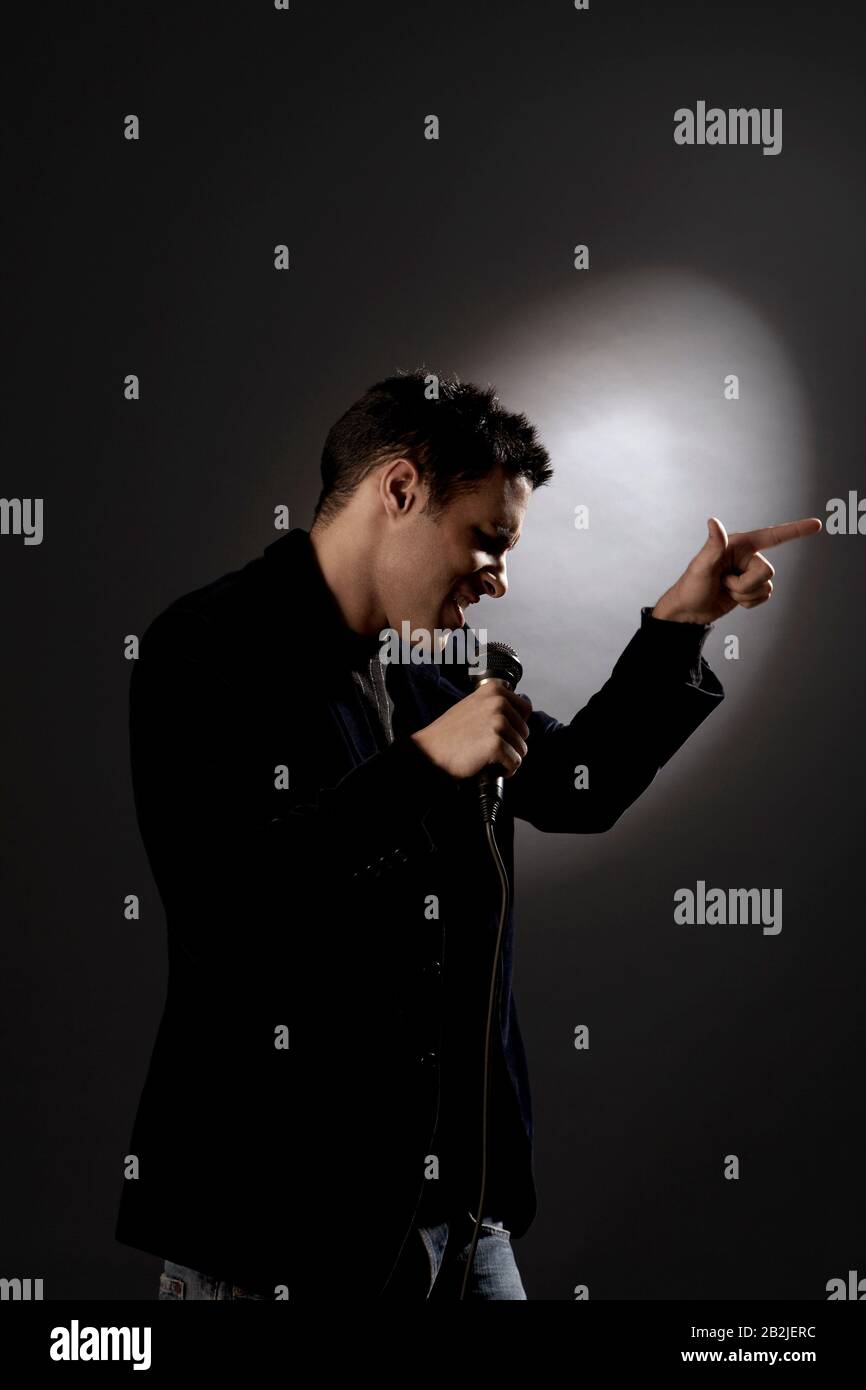 Side profile young man singing hi-res stock photography and images - Alamy