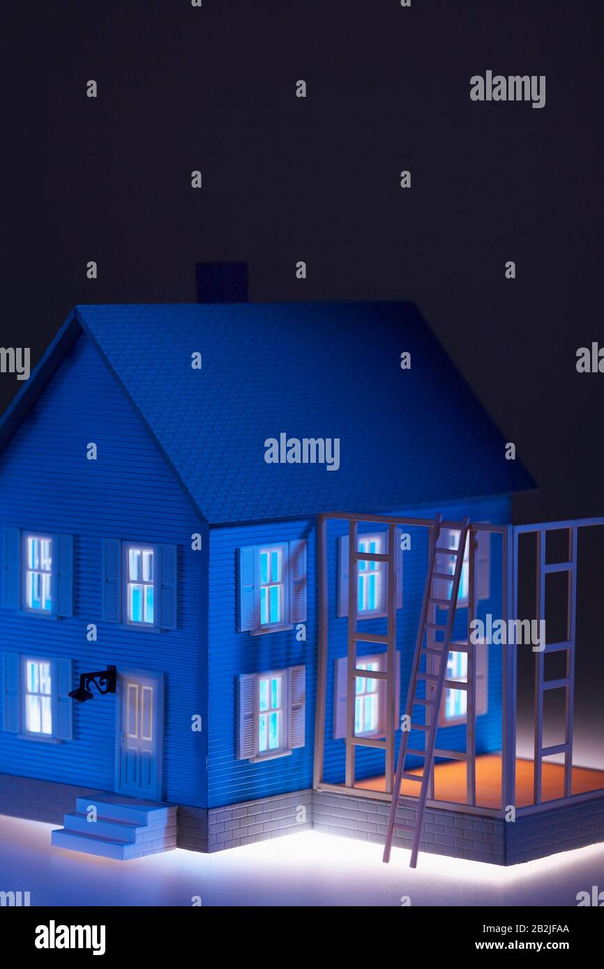 Illuminated model house Stock Photo - Alamy