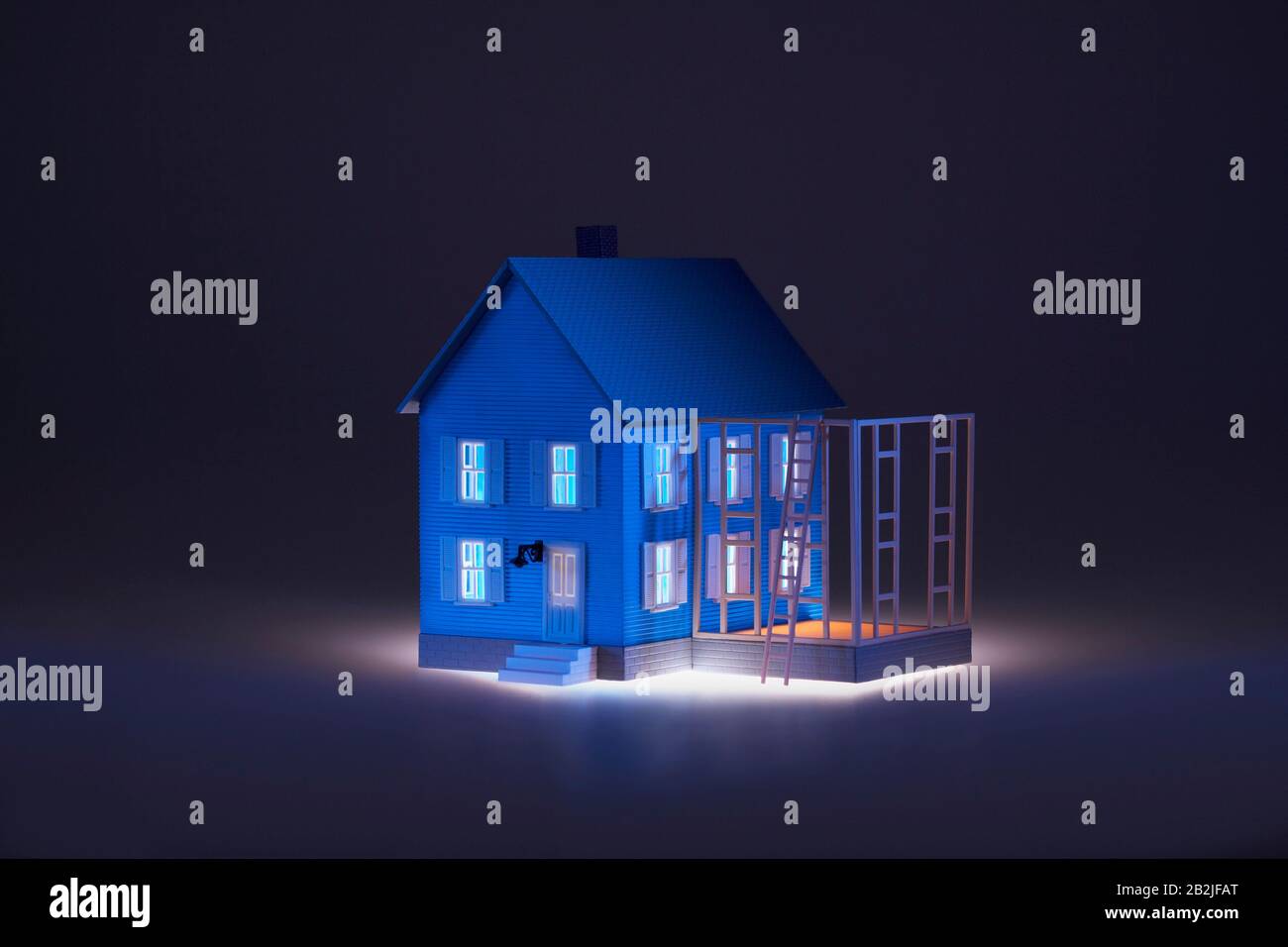 Illuminated model of house Stock Photo - Alamy