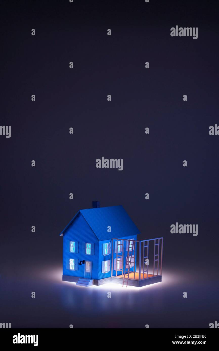 Illuminated model of house Stock Photo - Alamy