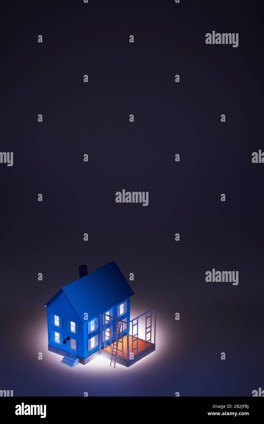 Illuminated model of house Stock Photo - Alamy