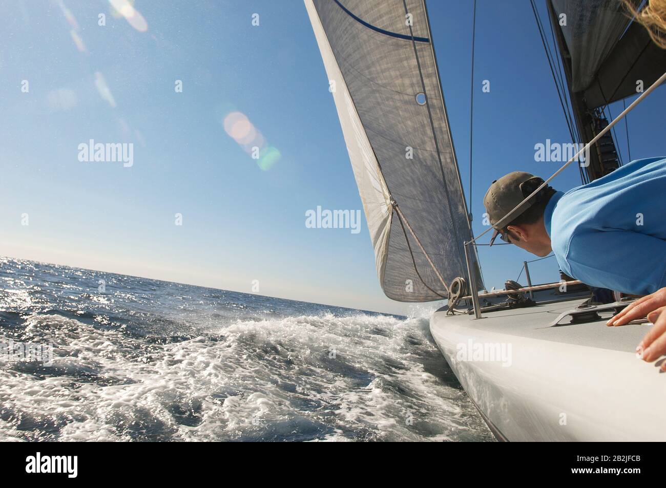 Sailor on yacht in ocean Stock Photo - Alamy