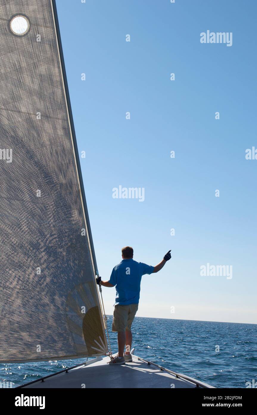 Sailor on yacht in ocean Stock Photo - Alamy