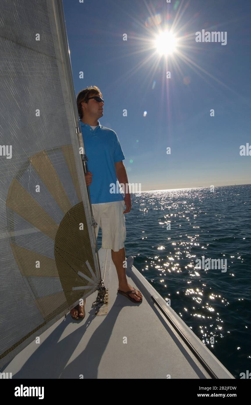 Sailor on yacht in ocean Stock Photo - Alamy