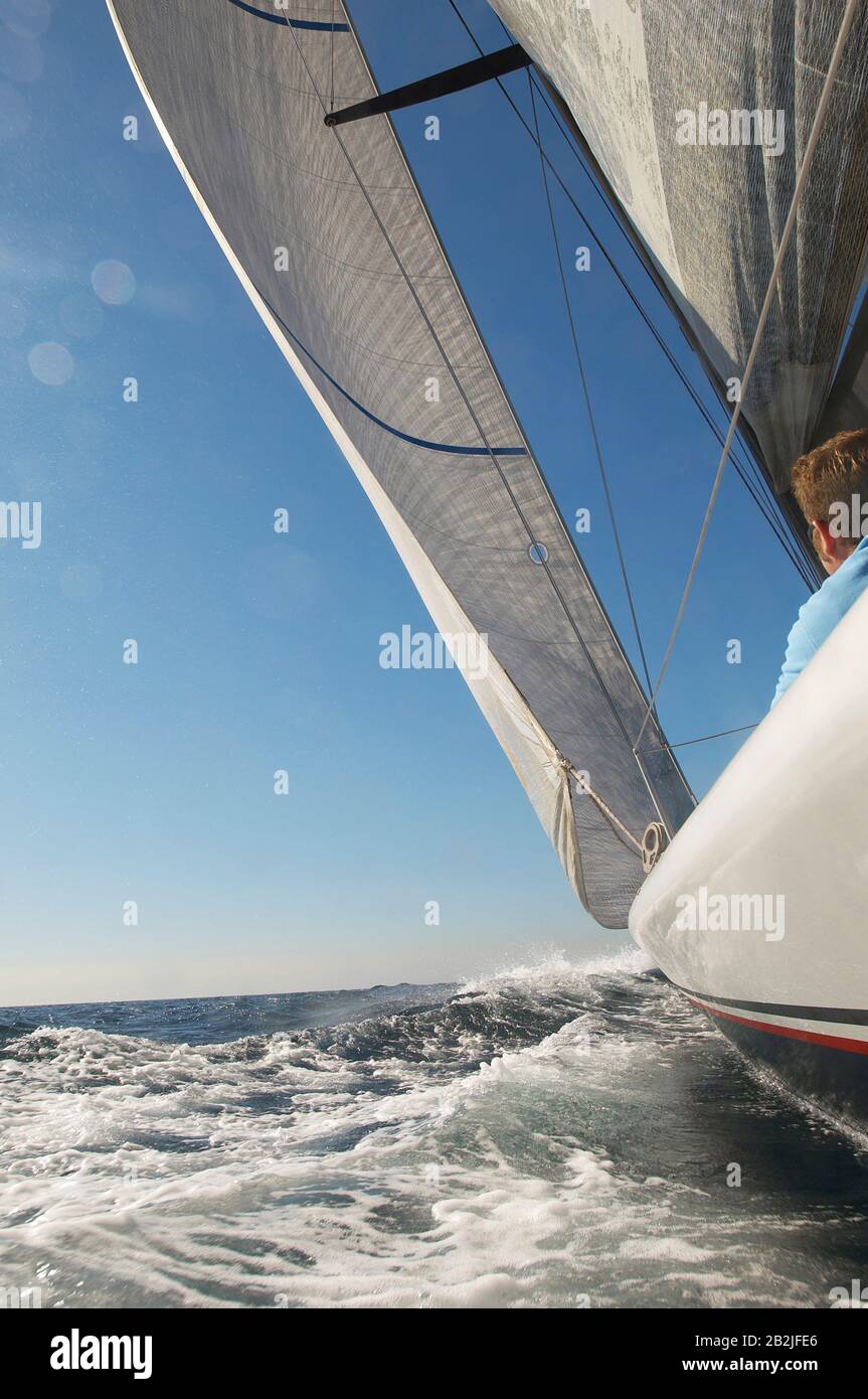Sailboat on ocean Stock Photo - Alamy