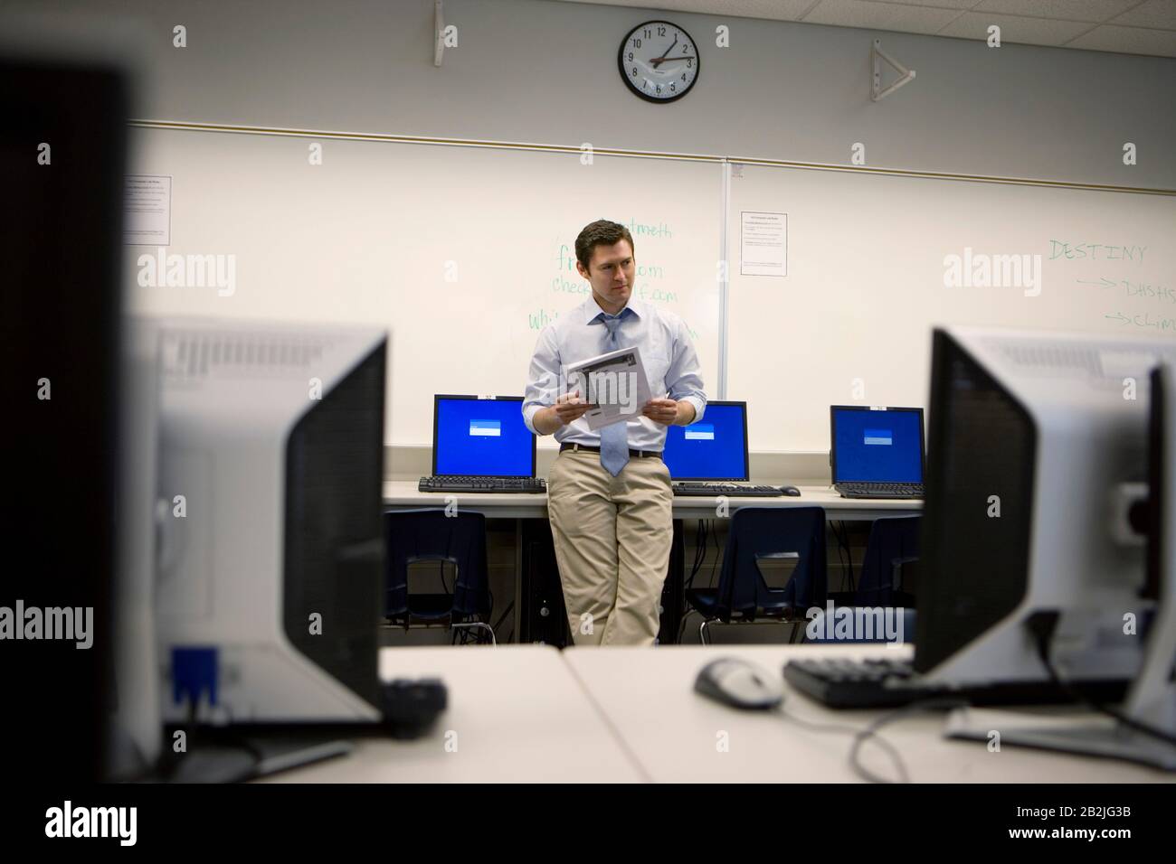 High School Teacher in Computer Lab Stock Photo - Alamy