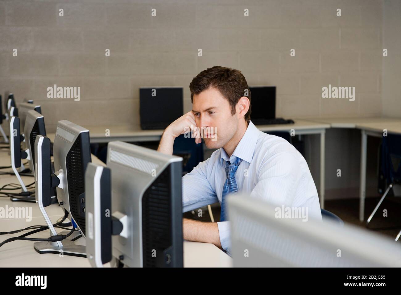 High School Teacher in Computer Lab Stock Photo - Alamy