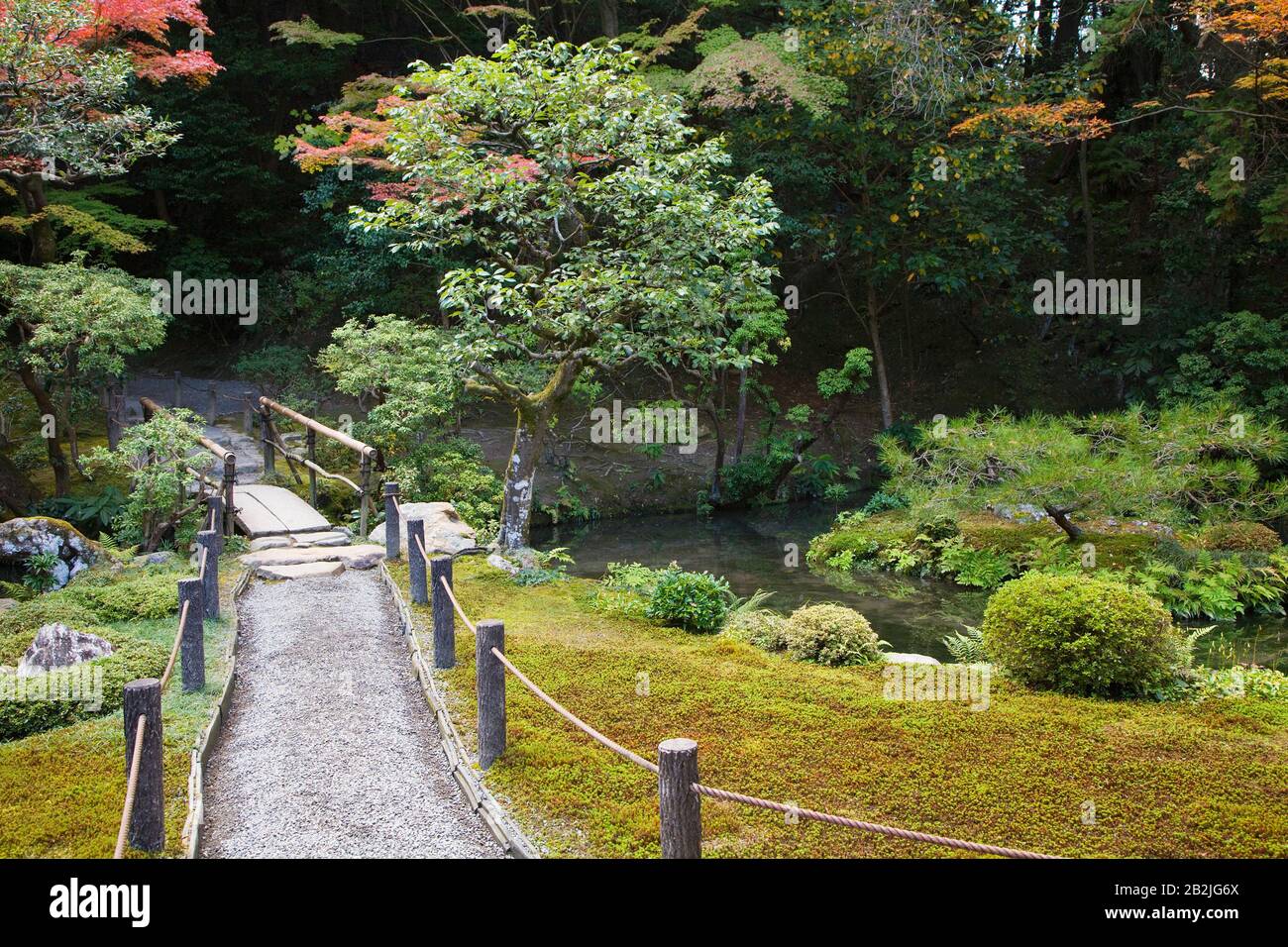 Japan Kyoto Tenju-an Temple garden with footpath and bridge Stock Photo ...