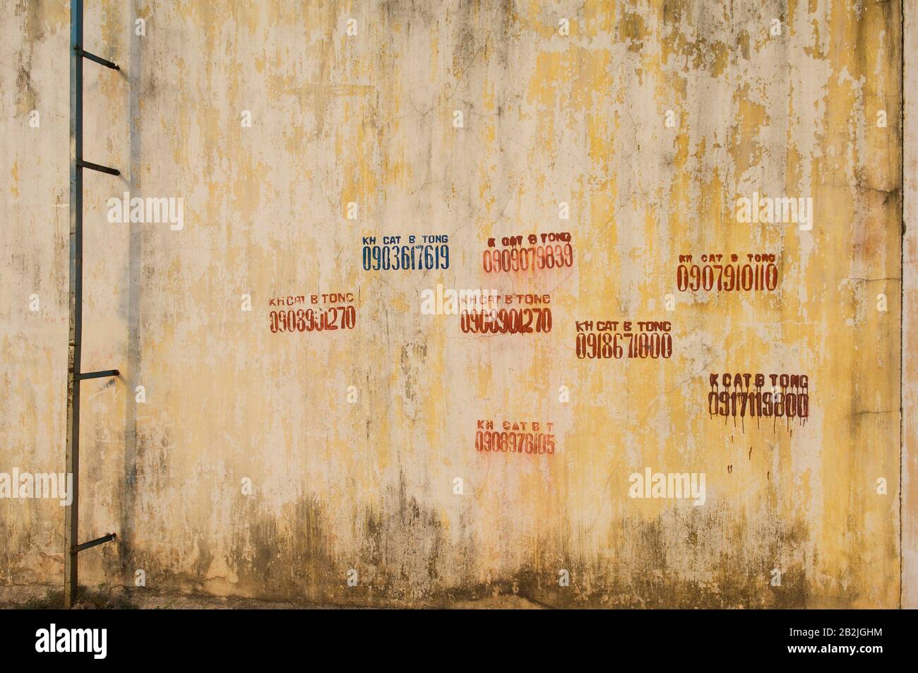 Numbers Stenciled on Side of Building Stock Photo - Alamy