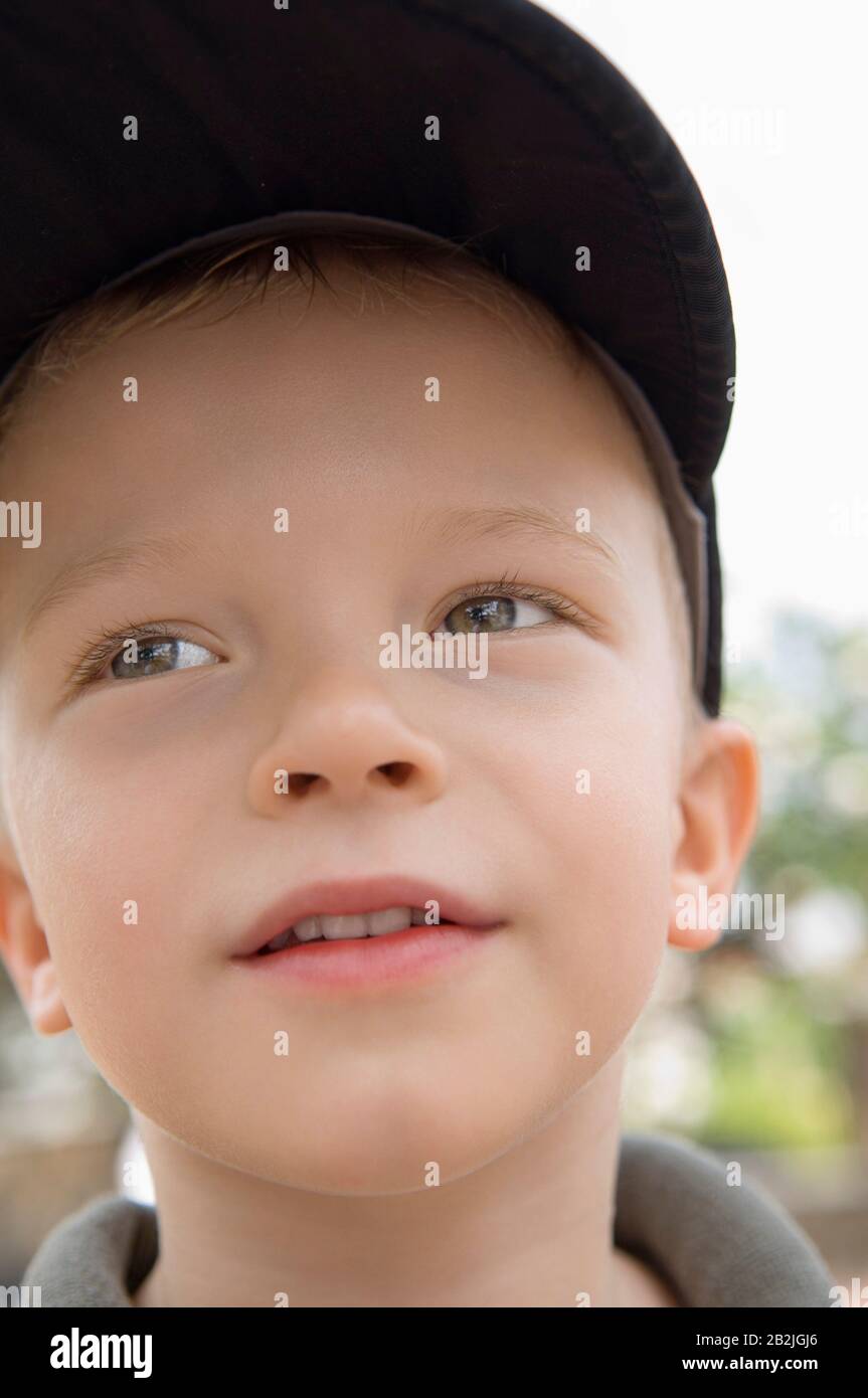Little Boy in Baseball Cap Stock Photo - Alamy