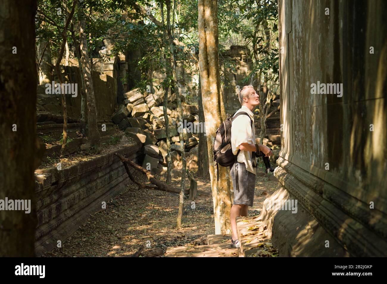 Tourist Among Ruins Stock Photo - Alamy