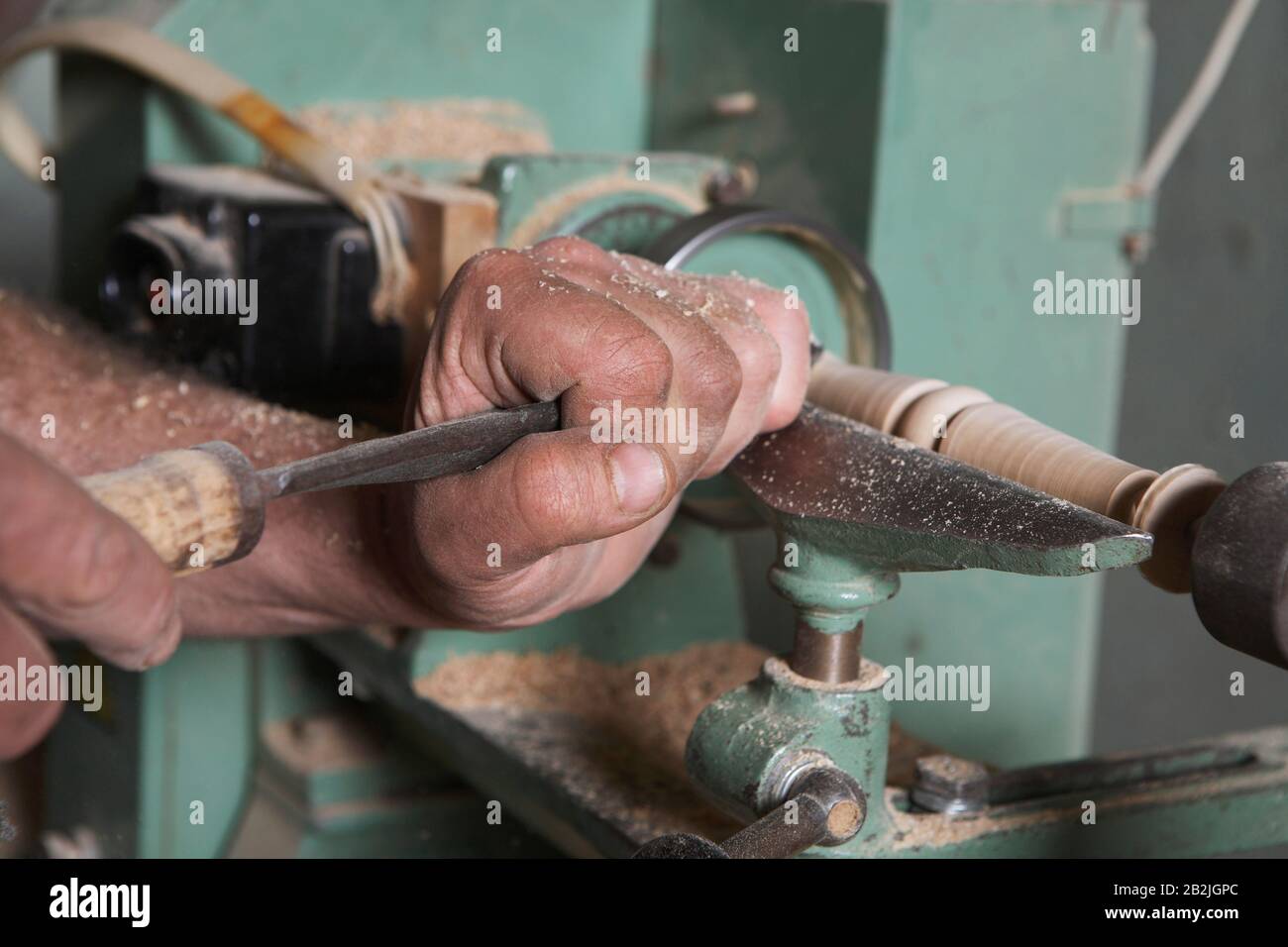 Carpenter Shaping Wood on a Lathe Stock Photo - Alamy