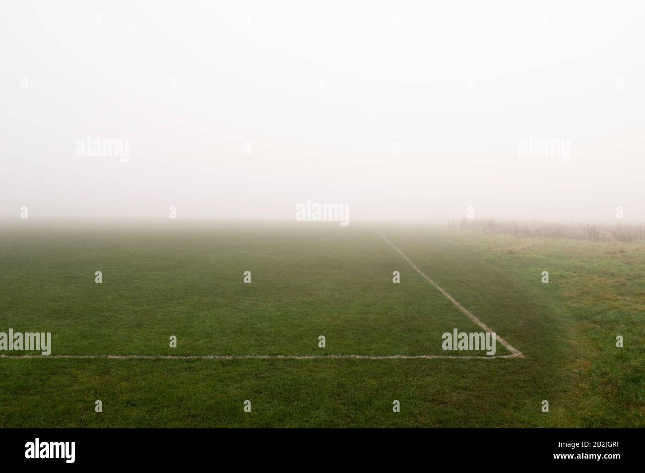 Fog above soccer field Stock Photo - Alamy