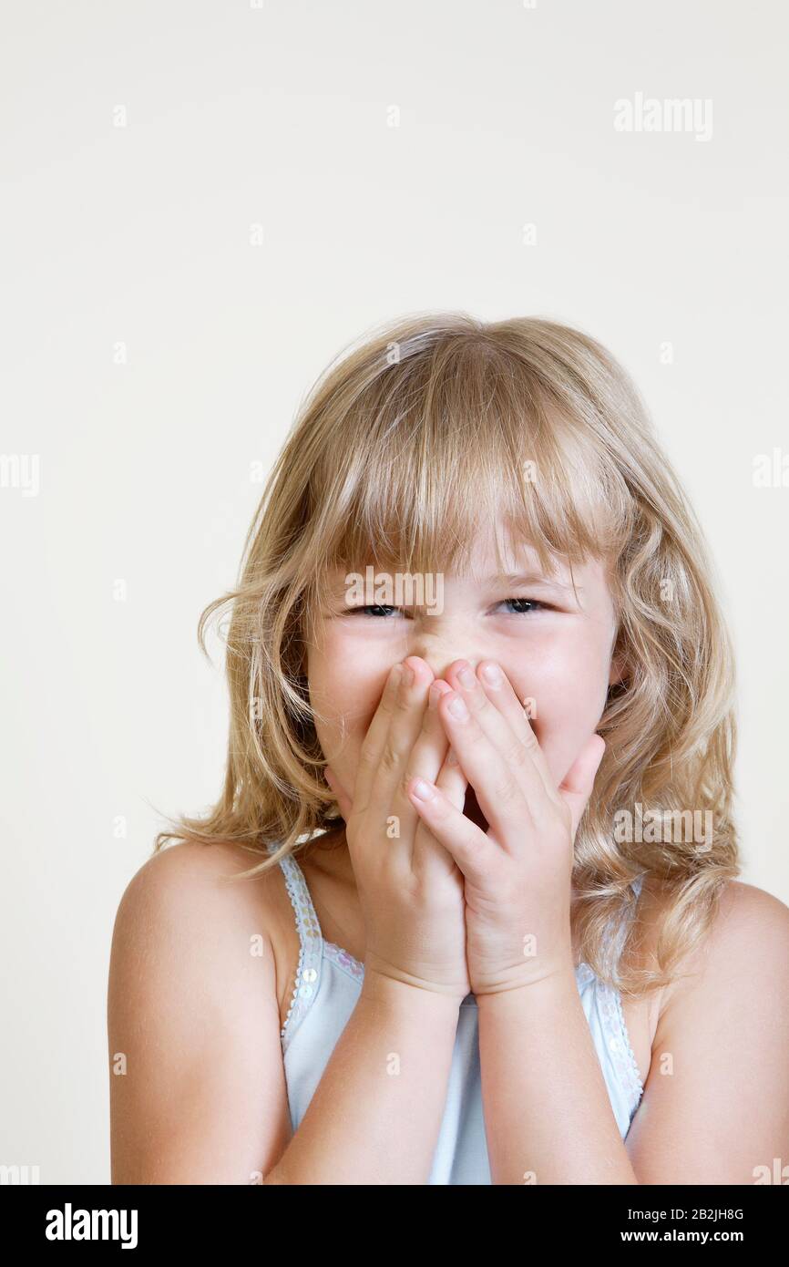 Little Girl Giggling Stock Photo - Alamy