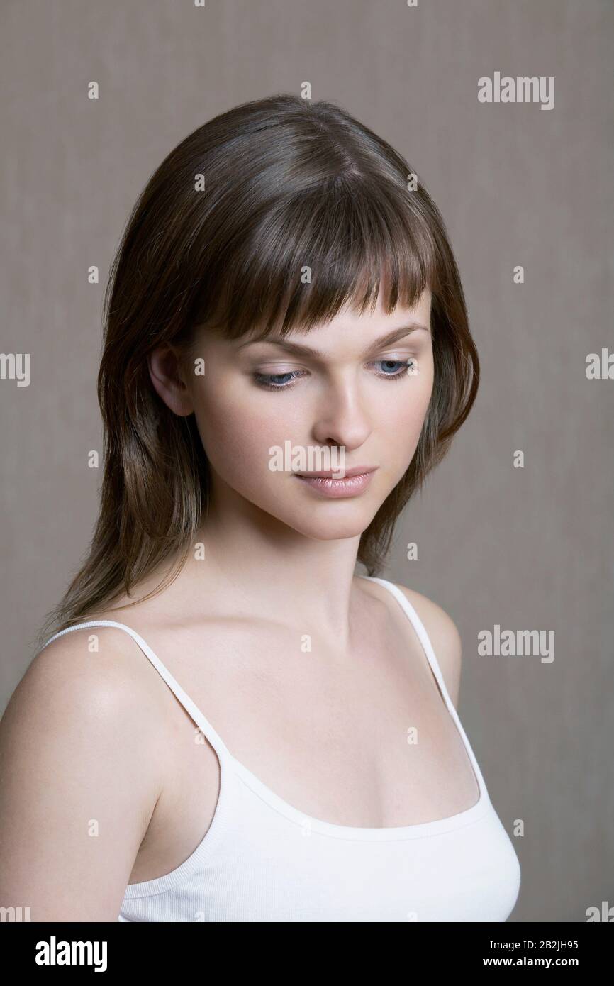 Lady looking downward hi-res stock photography and images - Alamy