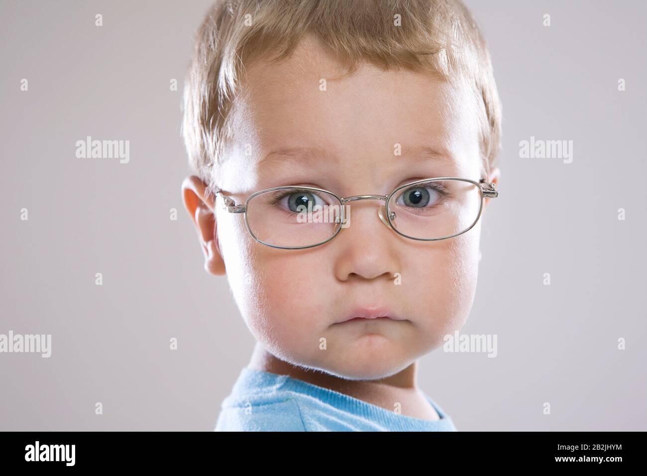 Boy in glasses portrait Stock Photo - Alamy