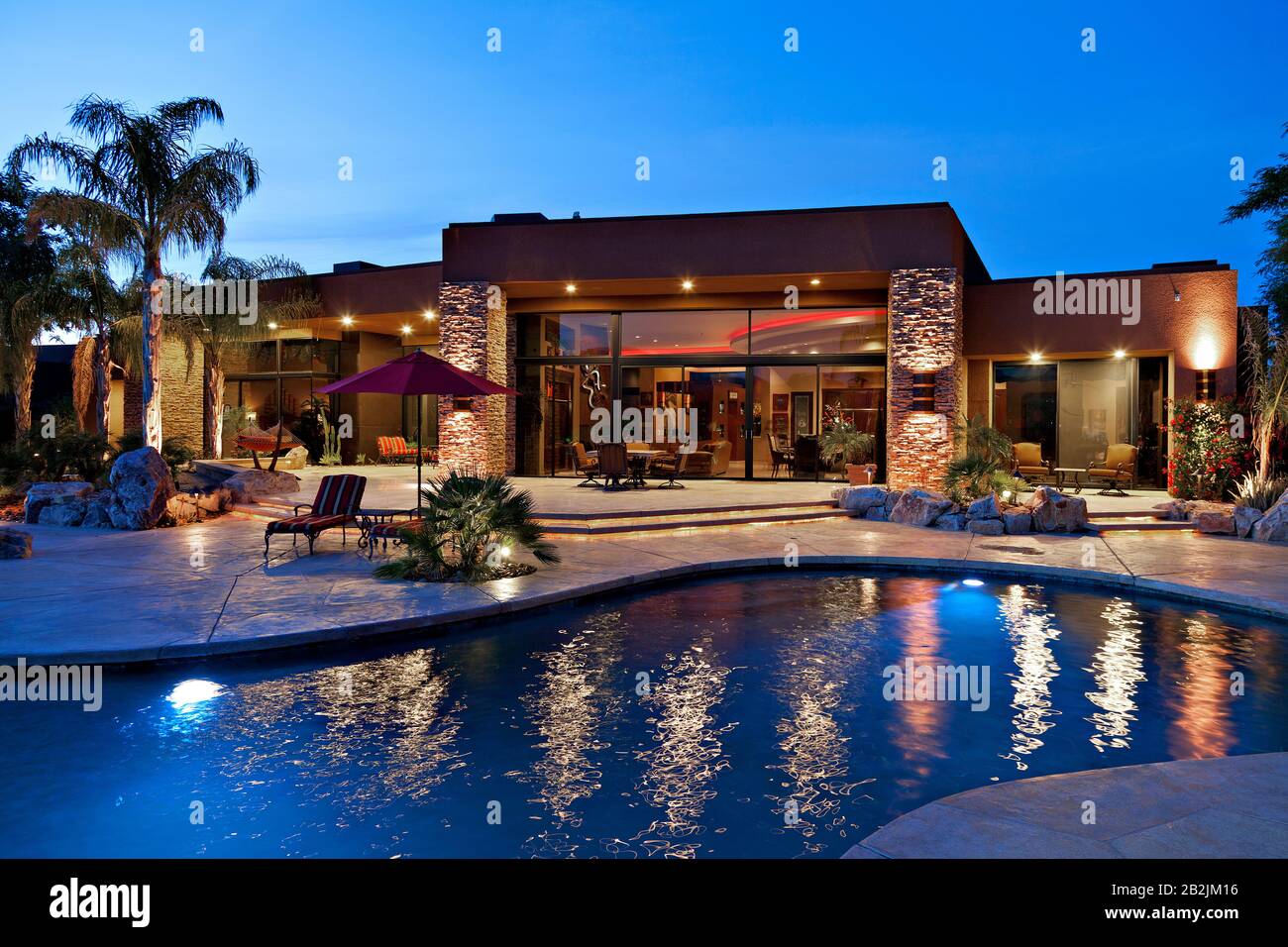 Luxurious mansion with swimming pool Stock Photo - Alamy