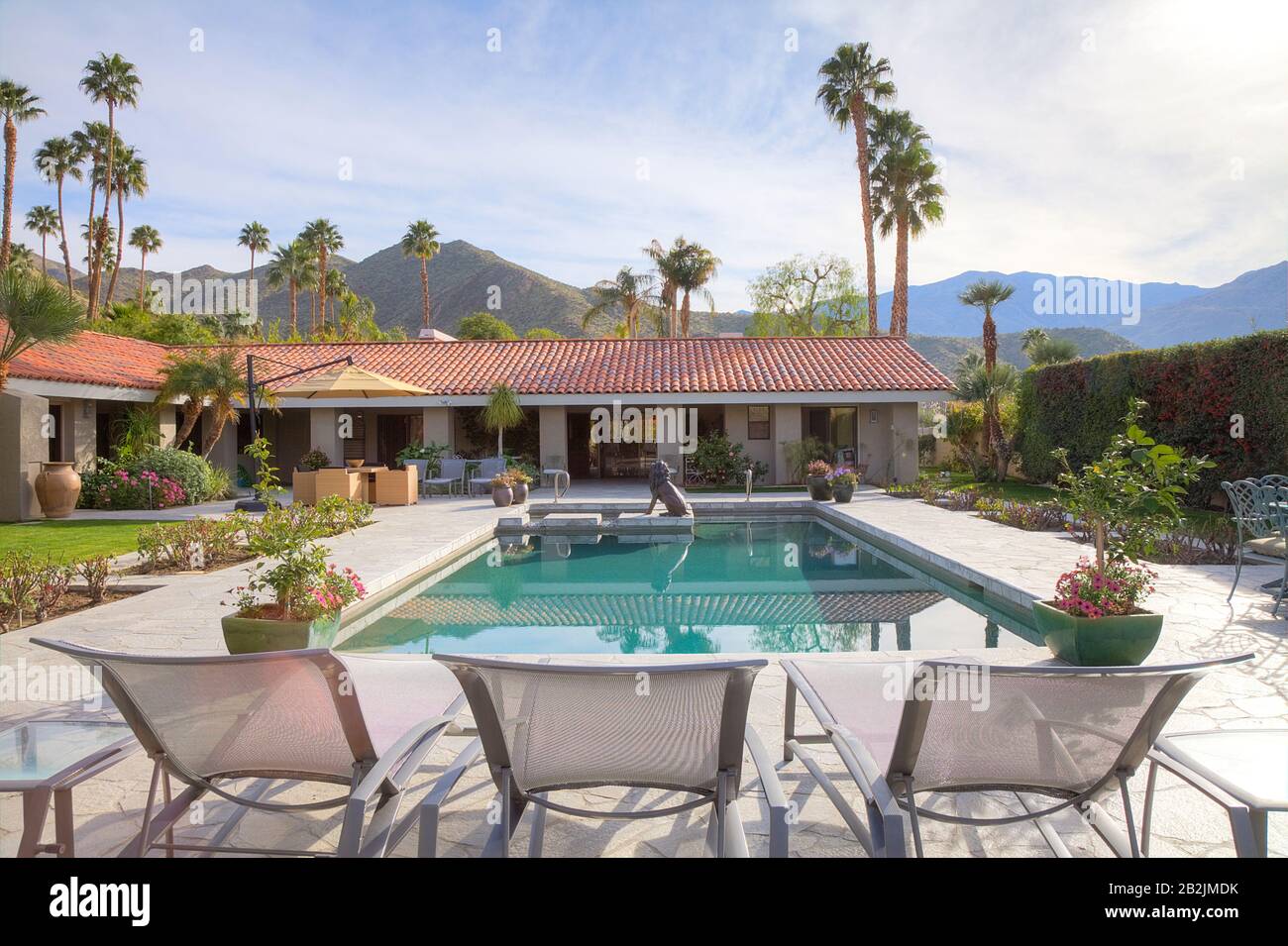 Swimming pool outside luxurious country house Stock Photo - Alamy