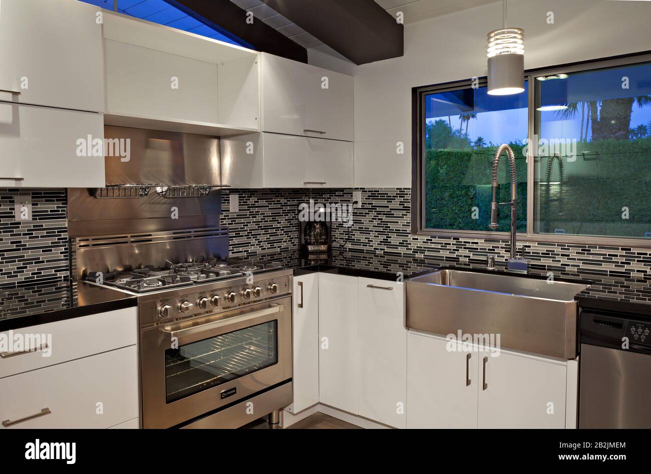 Modern kitchen counter in mansion Stock Photo - Alamy