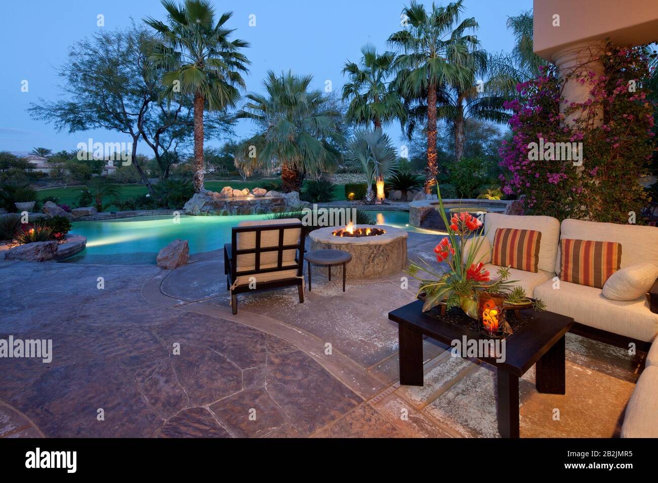 Outdoor seating furniture in patio of manor house Stock Photo - Alamy