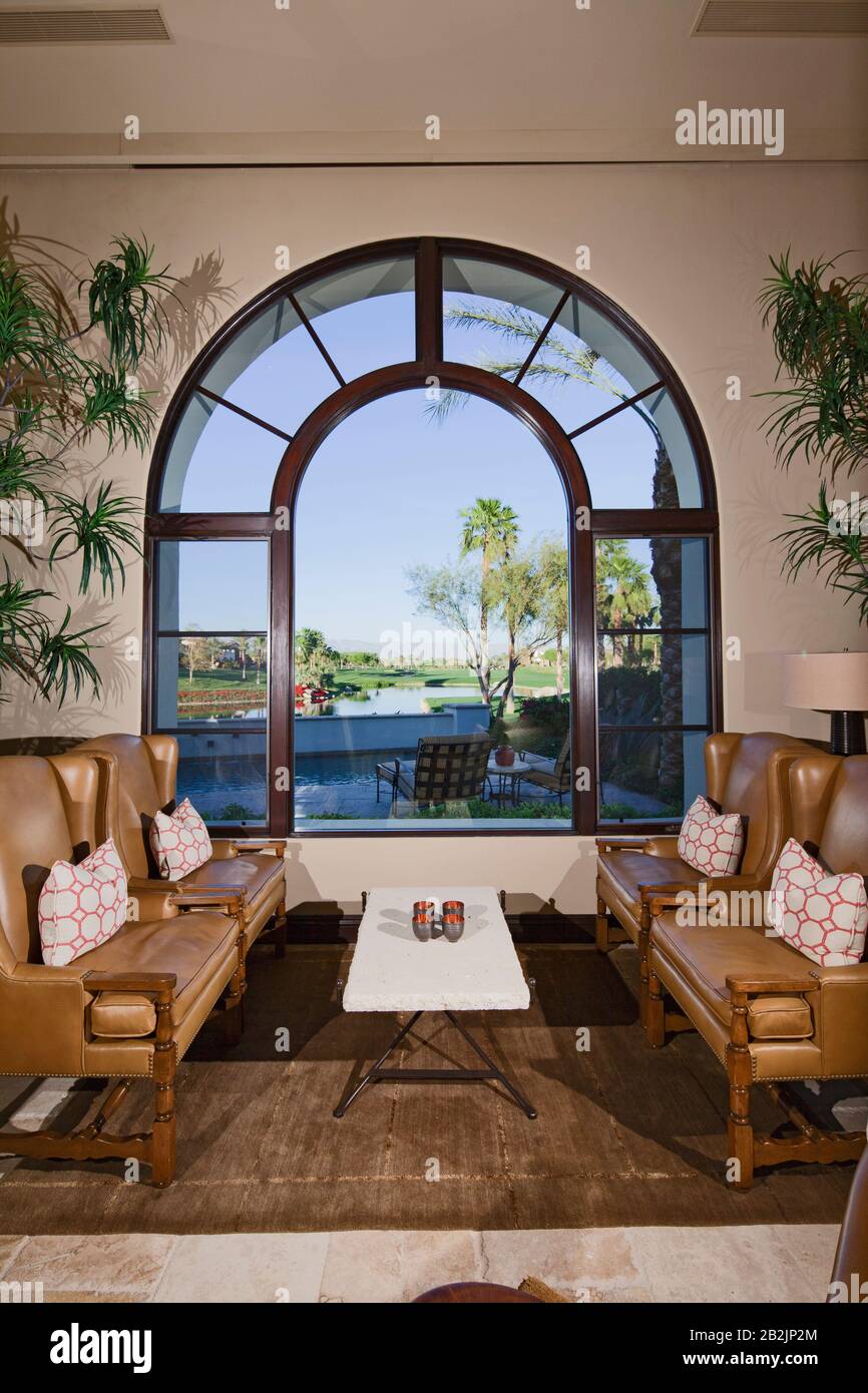 Living room interior with seating furniture near window Stock Photo - Alamy