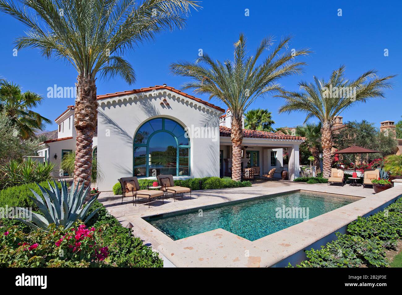 Small swimming pool in luxury villa Stock Photo - Alamy