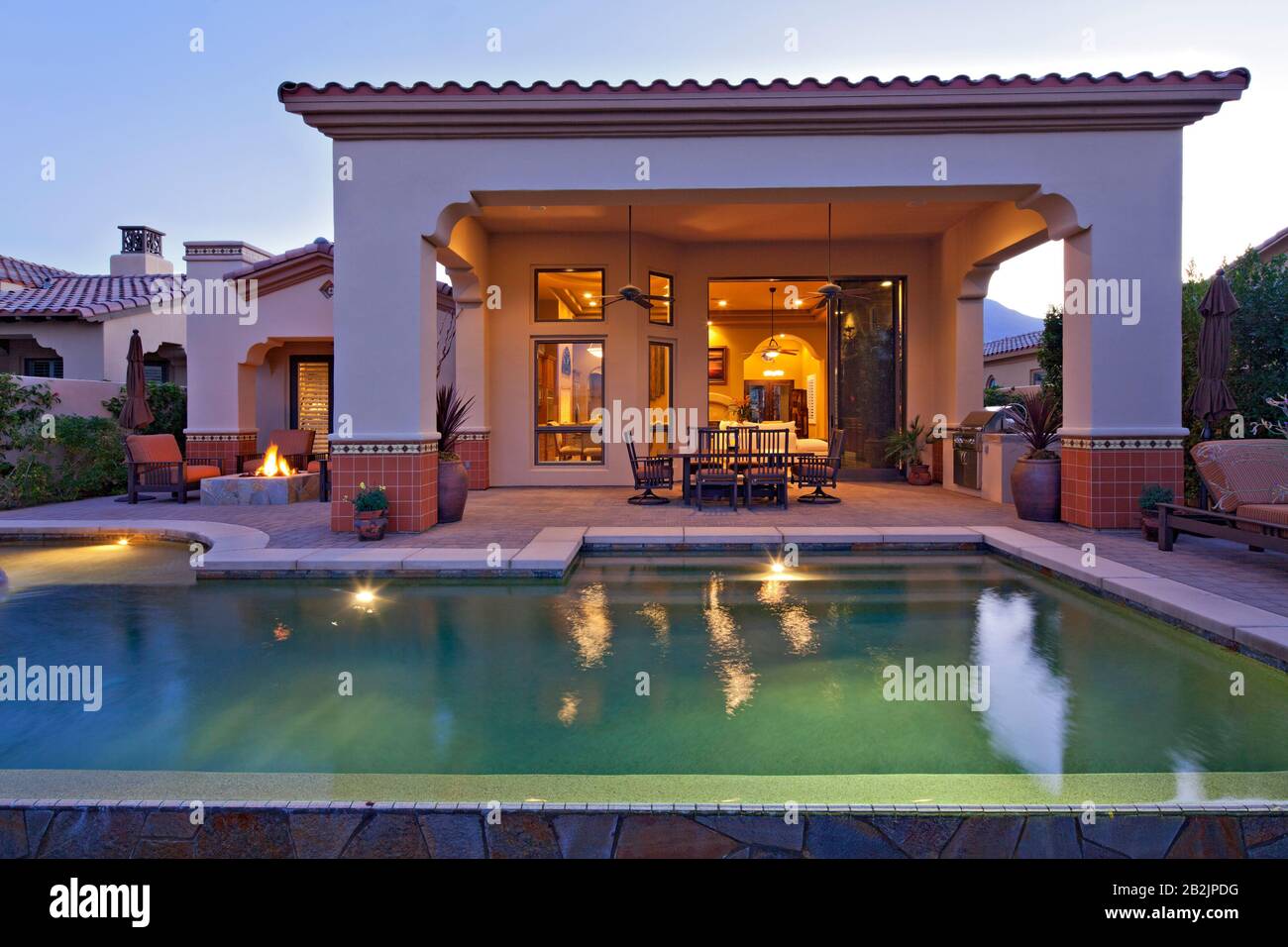 View of swimming pool in mansion Stock Photo - Alamy