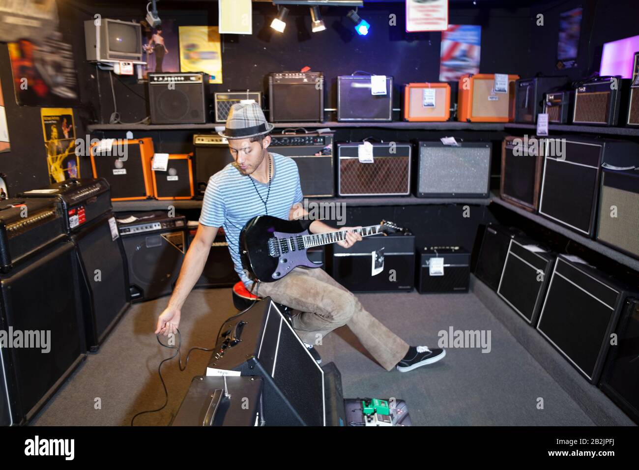 Plugged in guitar hi-res stock photography and images - Alamy