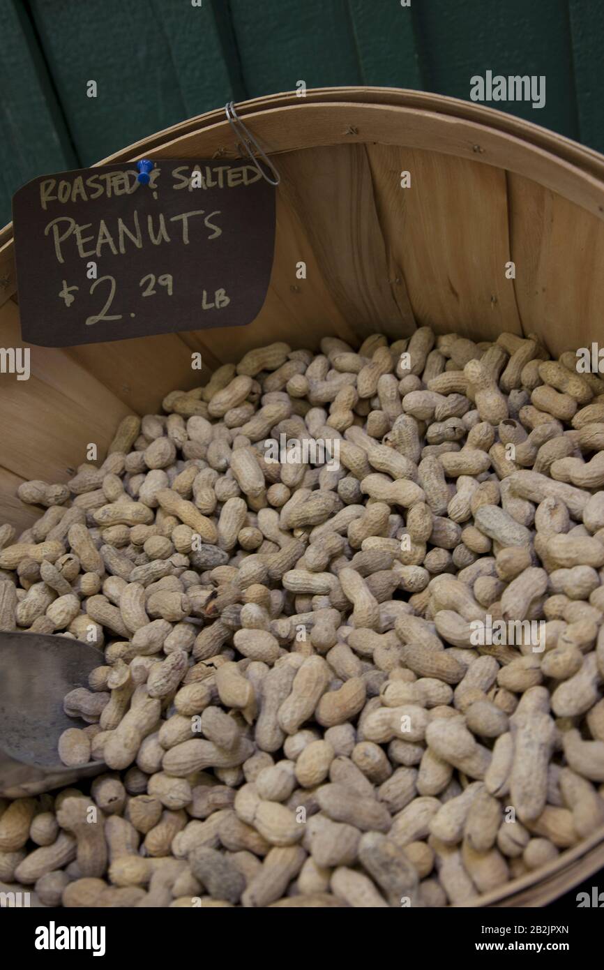 Peanuts in basket on display in market Stock Photo - Alamy