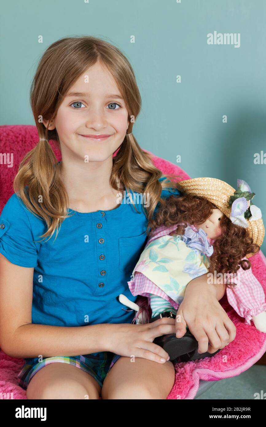 Girl sitting chair doll hi-res stock photography and images - Alamy