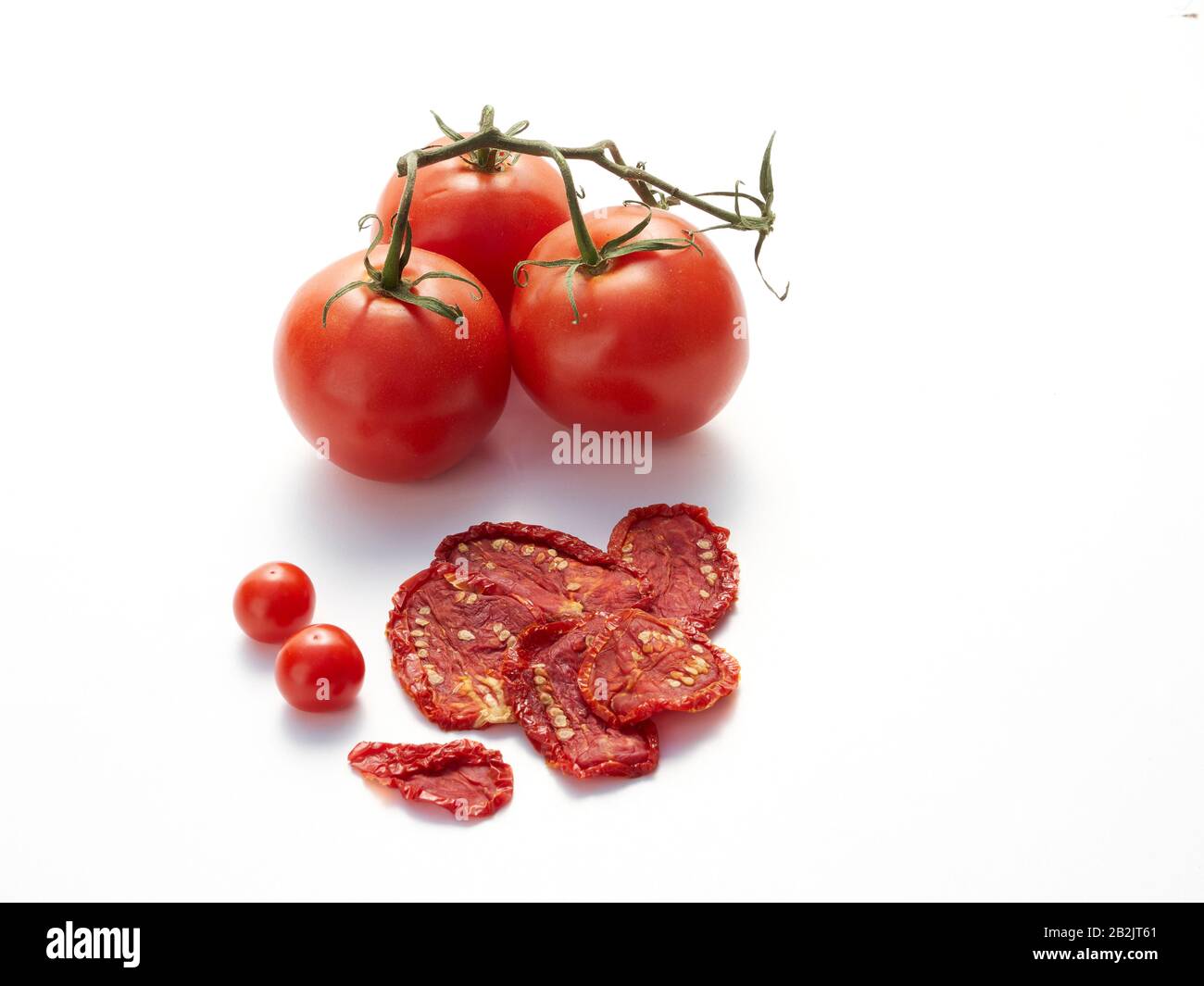 Sun Dried tomatoes in the sunshine on white Stock Photo - Alamy