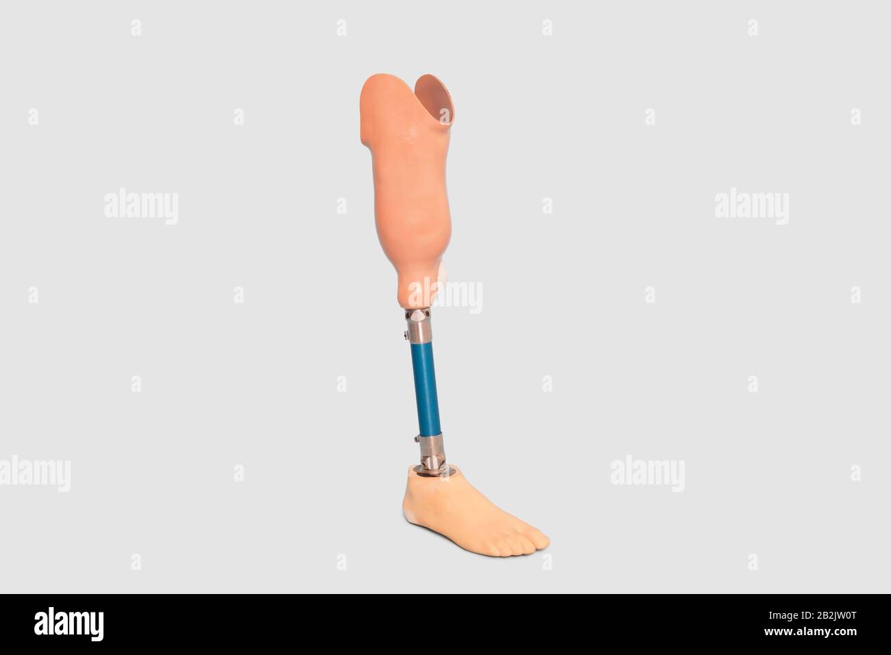 Prosthetic leg over grey background Stock Photo - Alamy