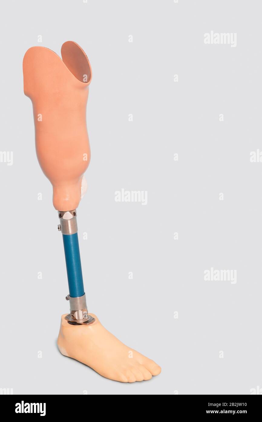 Prosthetic leg over grey background Stock Photo - Alamy