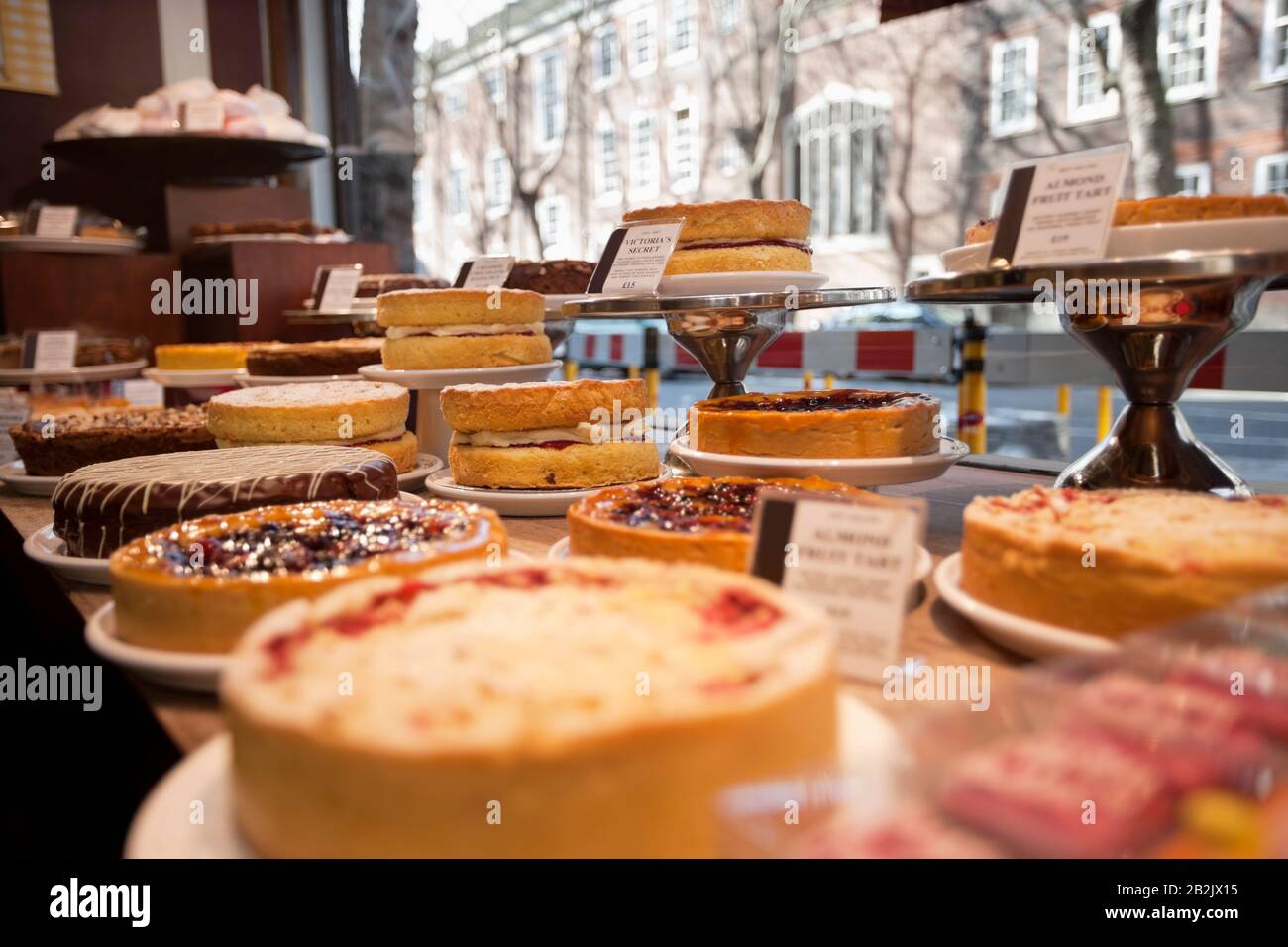 Fresh pastries displayed in bakery store Stock Photo - Alamy