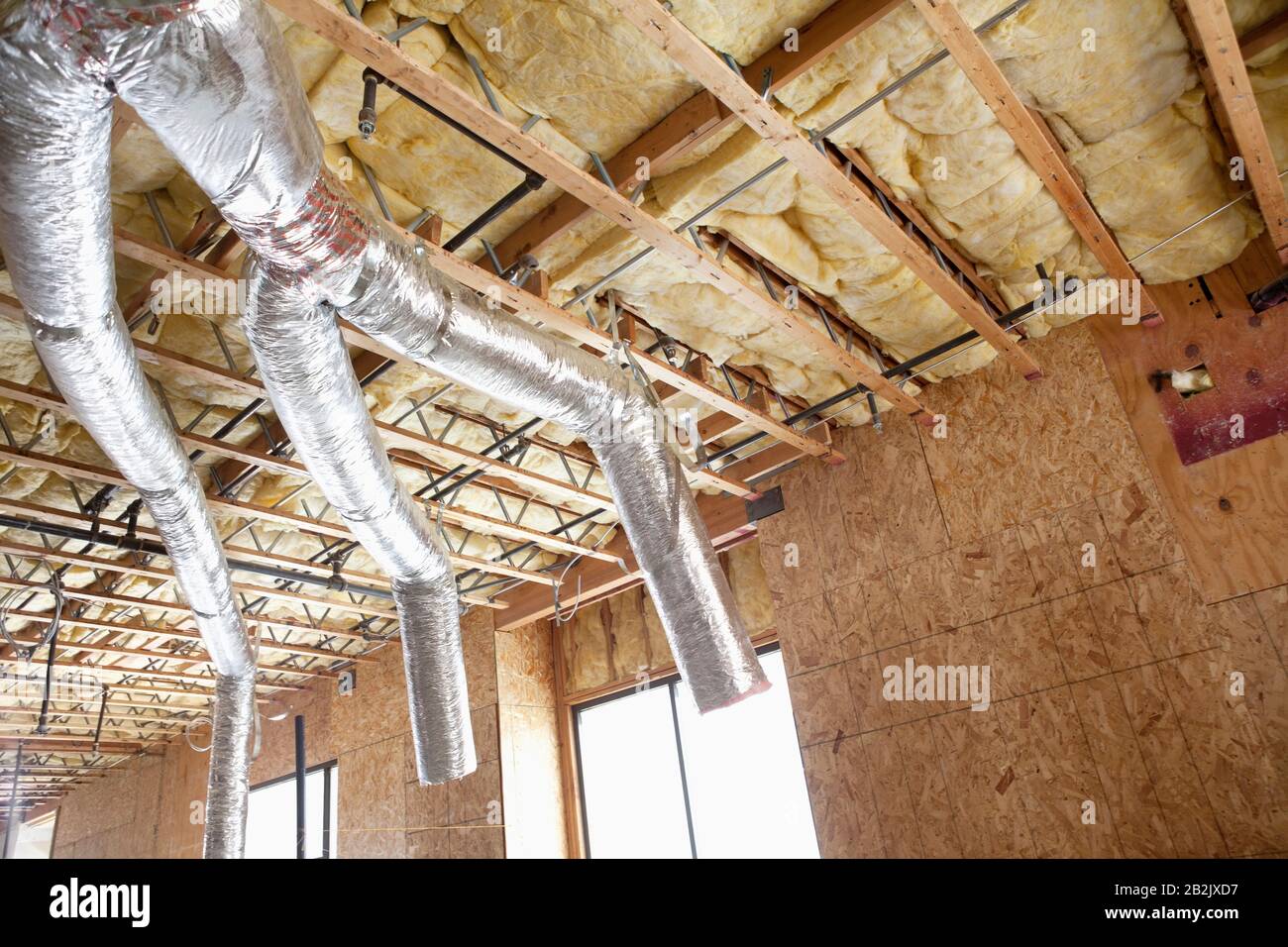 View of unfinished ceiling near window at construction site Stock Photo ...