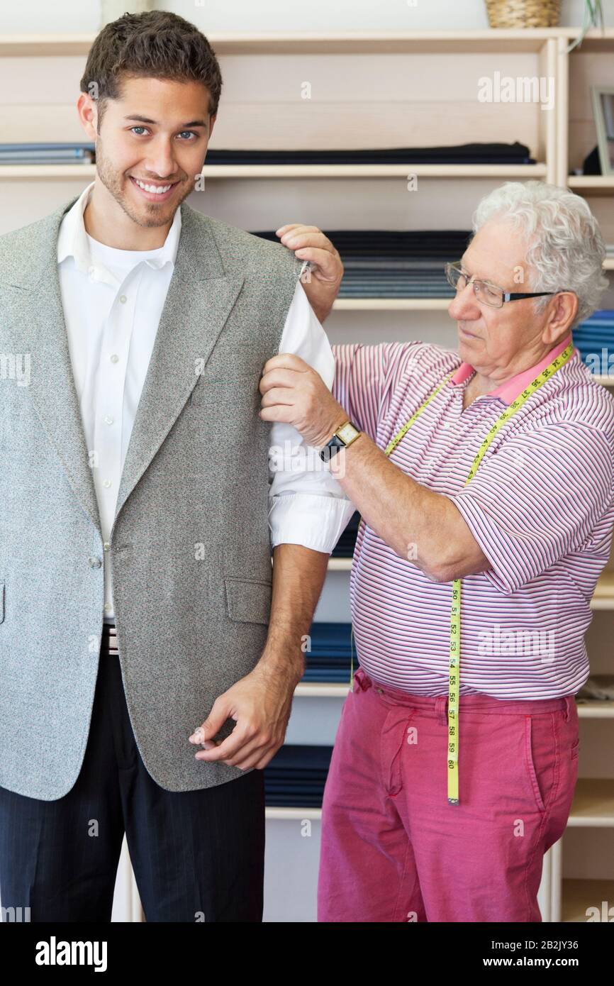 Two suits tailor hi-res stock photography and images - Alamy