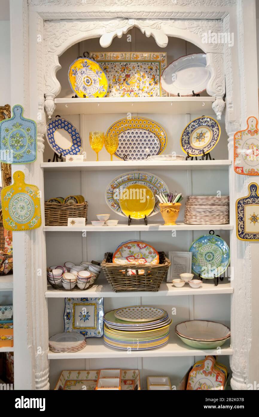 Variety of kitchenware arranged on shelf Stock Photo - Alamy