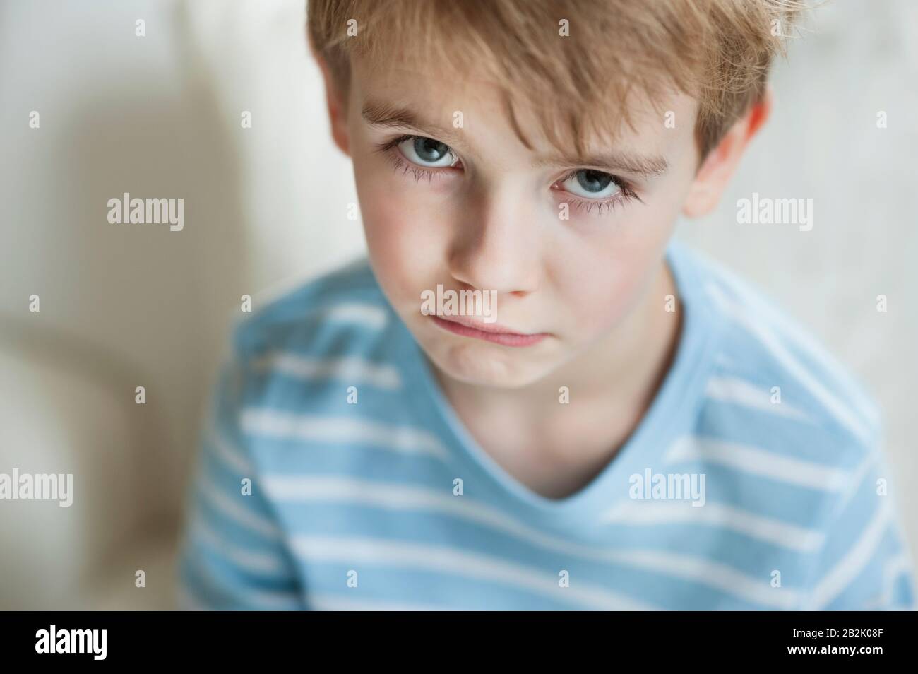 Portrait of a sad young boy Stock Photo - Alamy