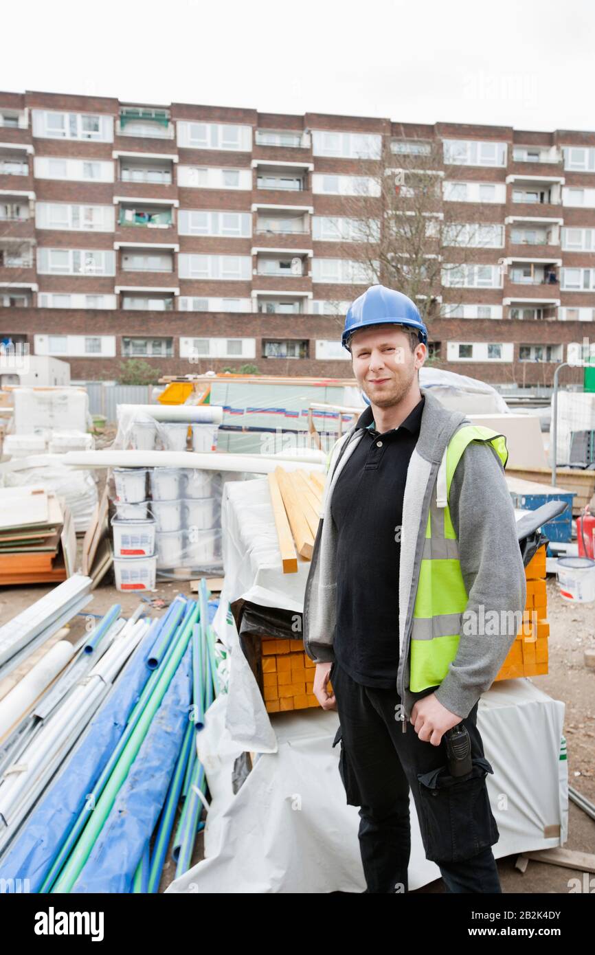 Portrait of a confident worker standing at construction site Stock ...